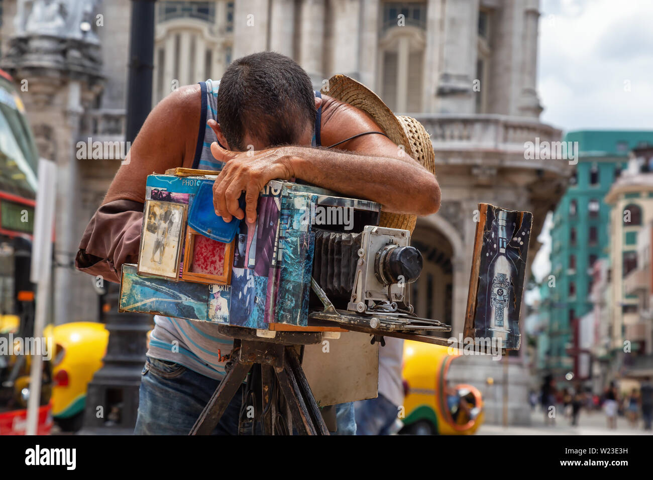 Havana, Cuba - May 29, 2019: Cuban photographer is using a Vintage ...