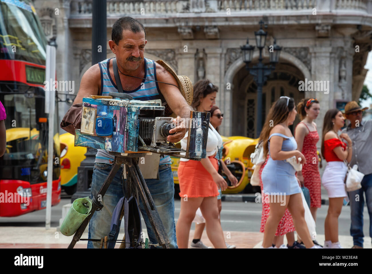 Havana, Cuba - May 29, 2019: Cuban photographer is using a Vintage ...
