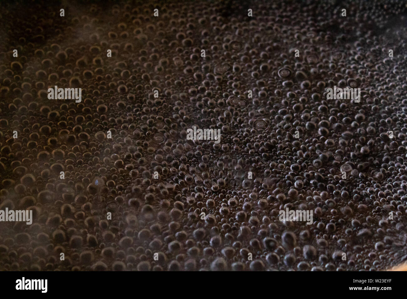 top view of boiling water on a kettle Stock Photo - Alamy