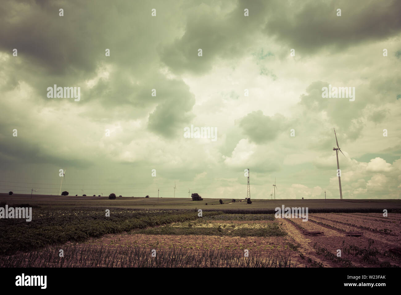 rural landscape with dark clouds gathering over fields Stock Photo - Alamy