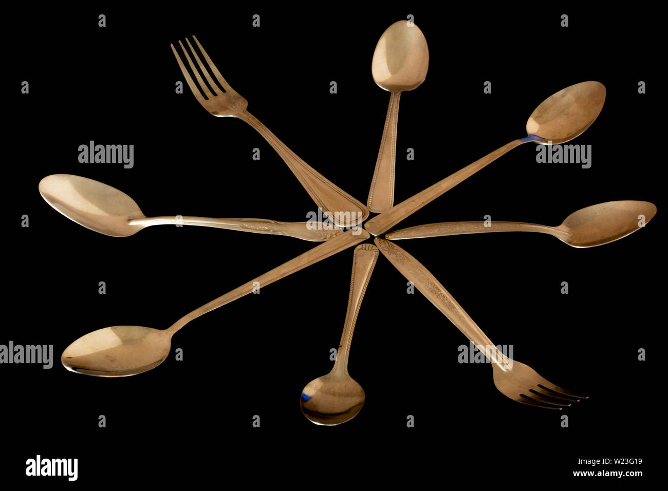 silverware with brown background Stock Photo - Alamy