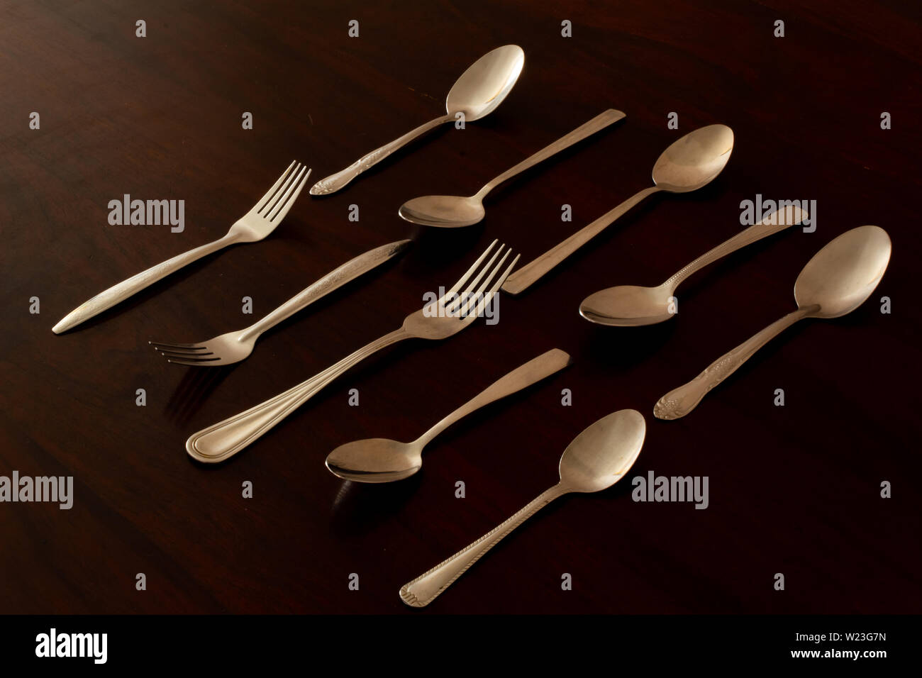 silverware with brown background Stock Photo - Alamy