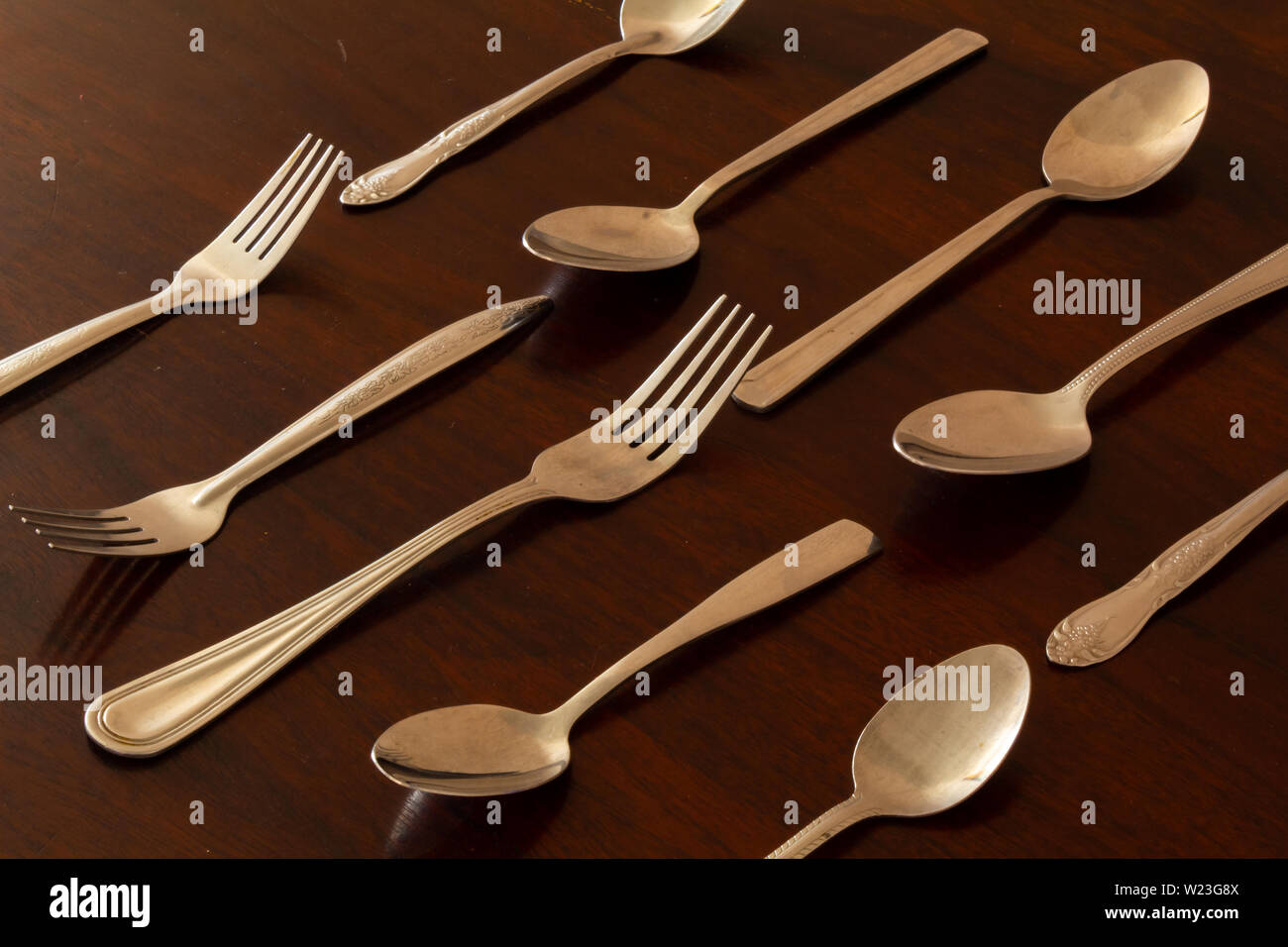 silverware with brown background Stock Photo - Alamy