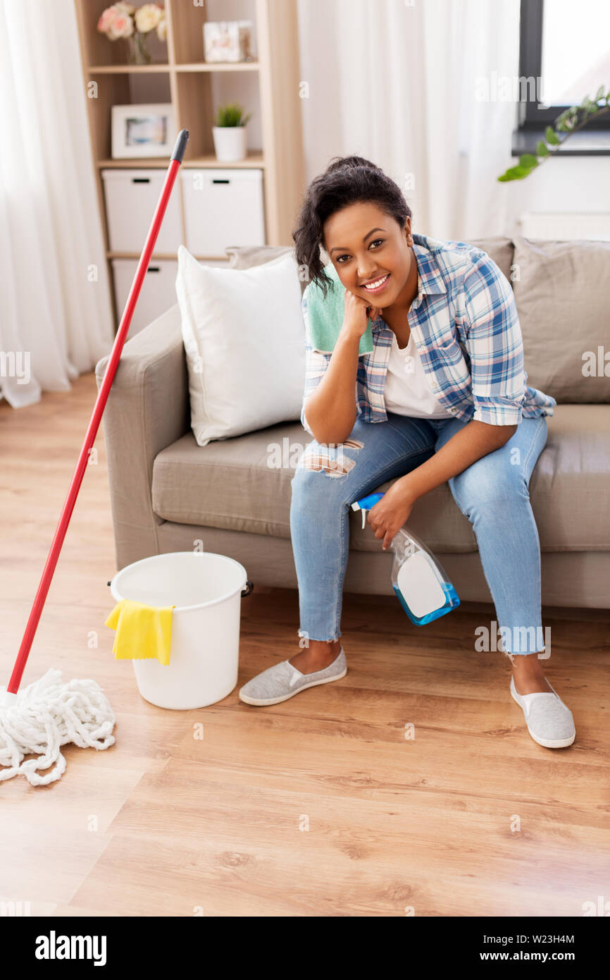 african woman or housewife after cleaning at home Stock Photo - Alamy