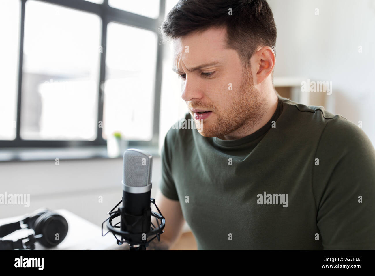 Man anxious microphone hi-res stock photography and images - Alamy