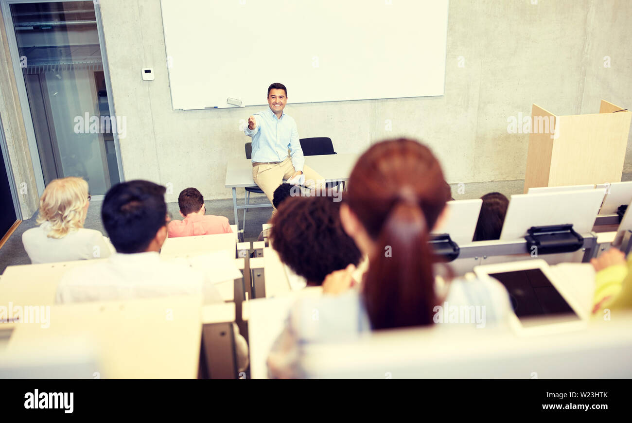 group of students and teacher at lecture Stock Photo - Alamy
