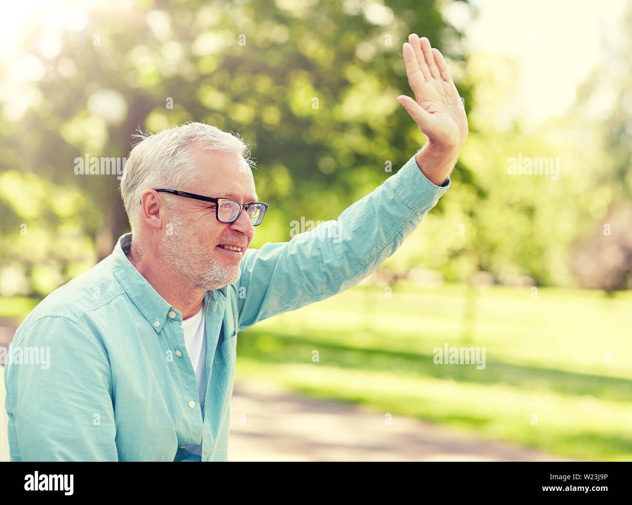 Elderly man waving hi-res stock photography and images - Alamy
