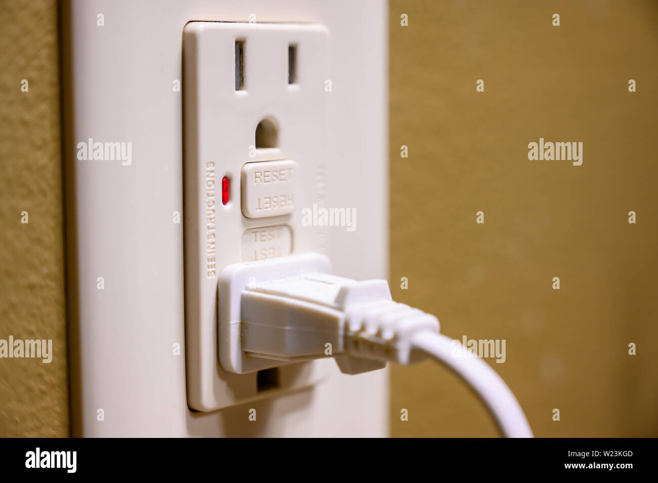 Tripped Ground Fault Interrupter Outlet with cord Stock Photo - Alamy
