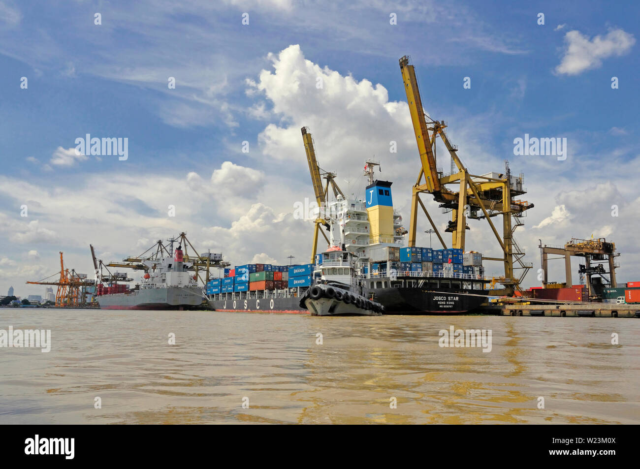 bangkok, thailand - august 28, 2008: containerships loading and ...