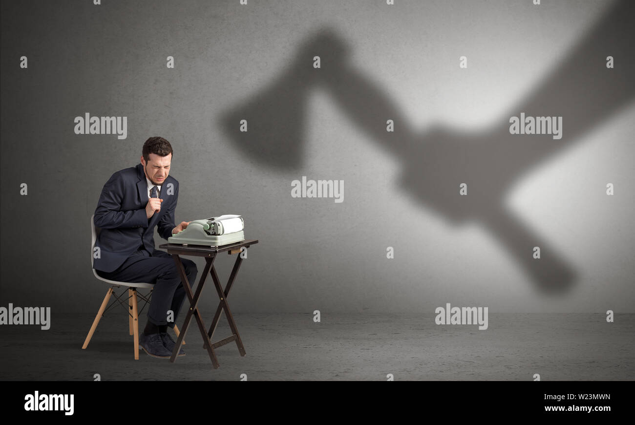 Shadow threatening hard worker man who is afraid Stock Photo - Alamy