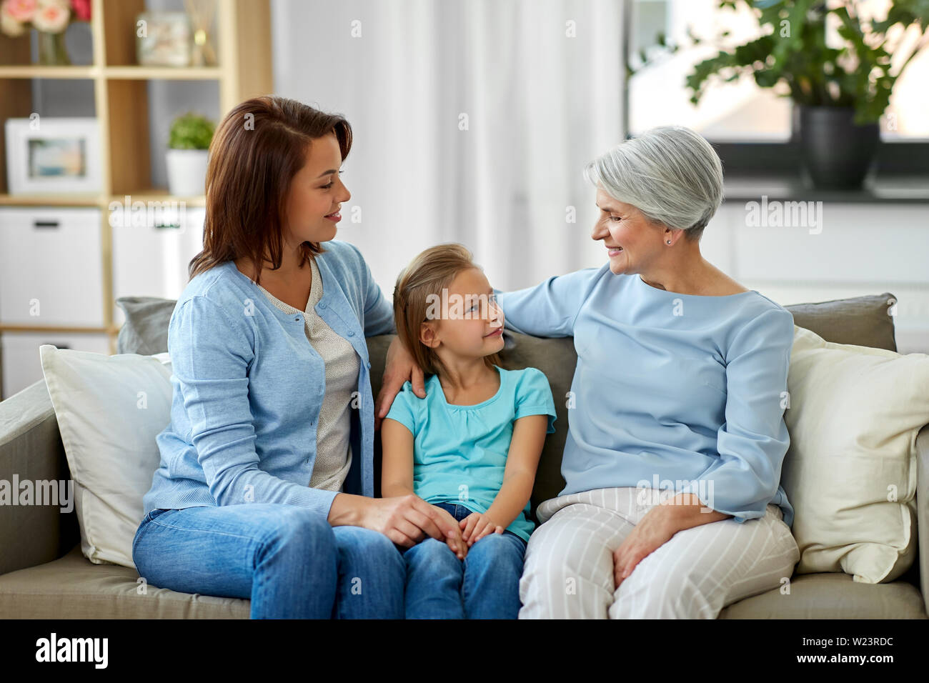 Preteen talking to an adult sofa hi-res stock photography and images - Alamy