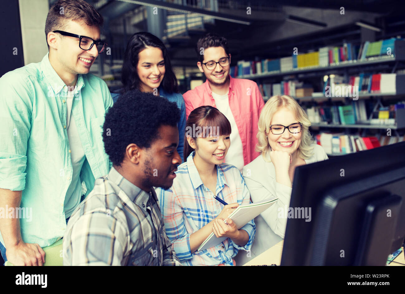 international students with computers at library Stock Photo - Alamy