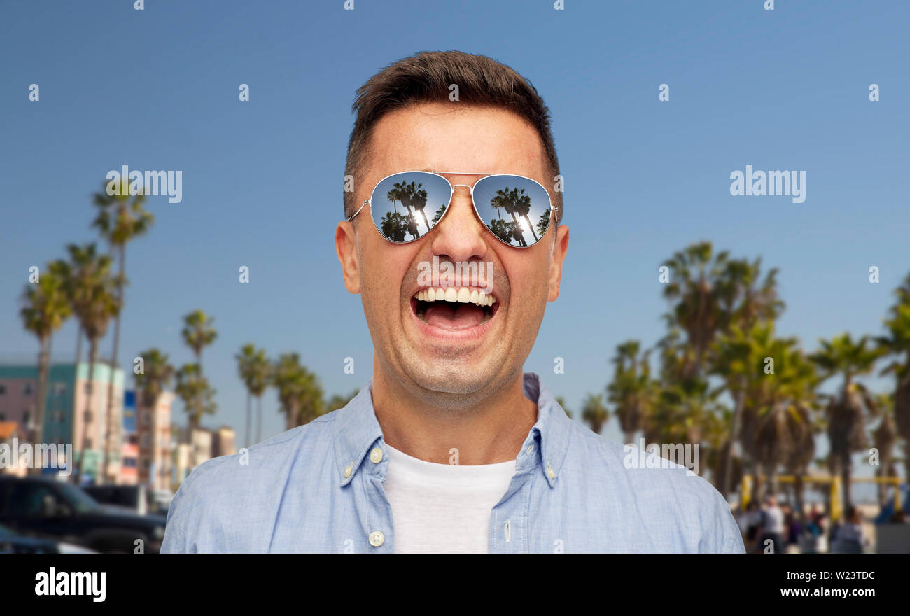 Laughing hispanic man in hi-res stock photography and images - Alamy