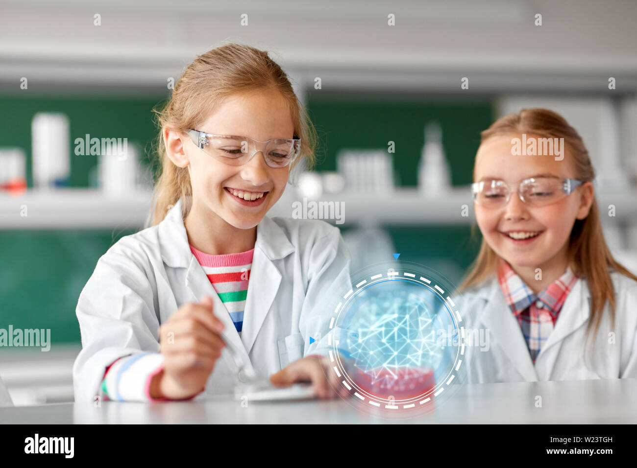 kids making chemical experiment at school lab Stock Photo - Alamy
