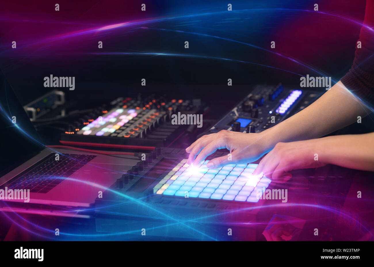 Hand mixing music on midi controller with wave vibe concept Stock Photo ...