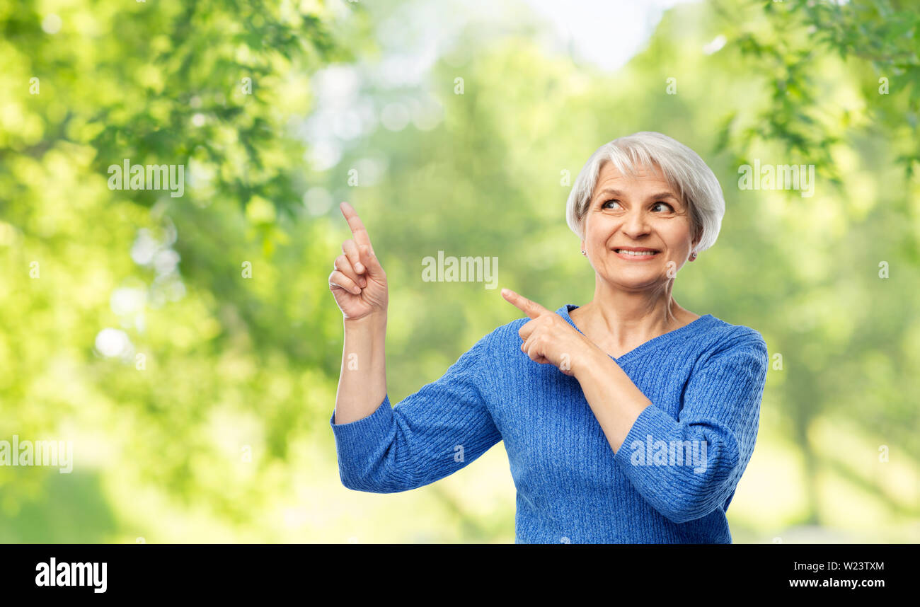 Pointing old woman hi-res stock photography and images - Alamy