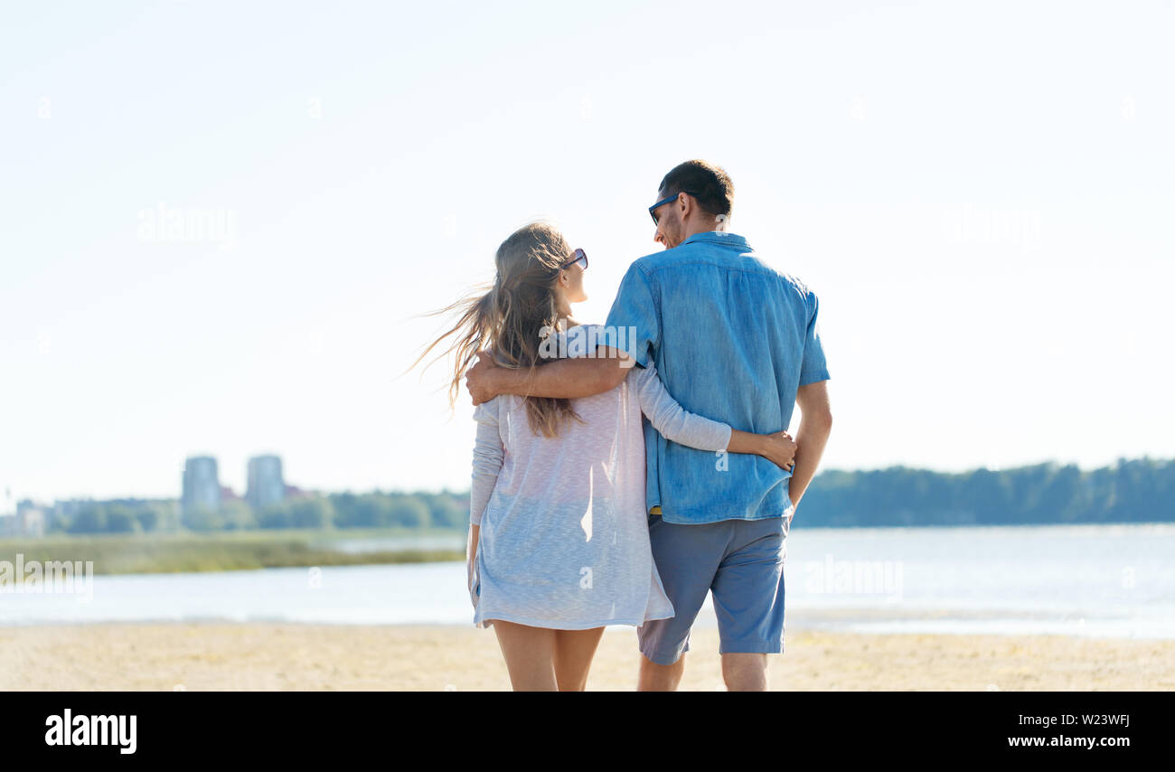 Back view couple talking hugging hi-res stock photography and images ...