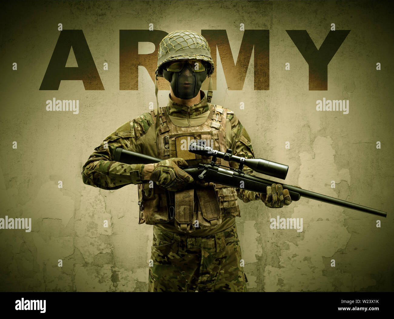 Uniformed armed soldier with damaged wall background Stock Photo - Alamy