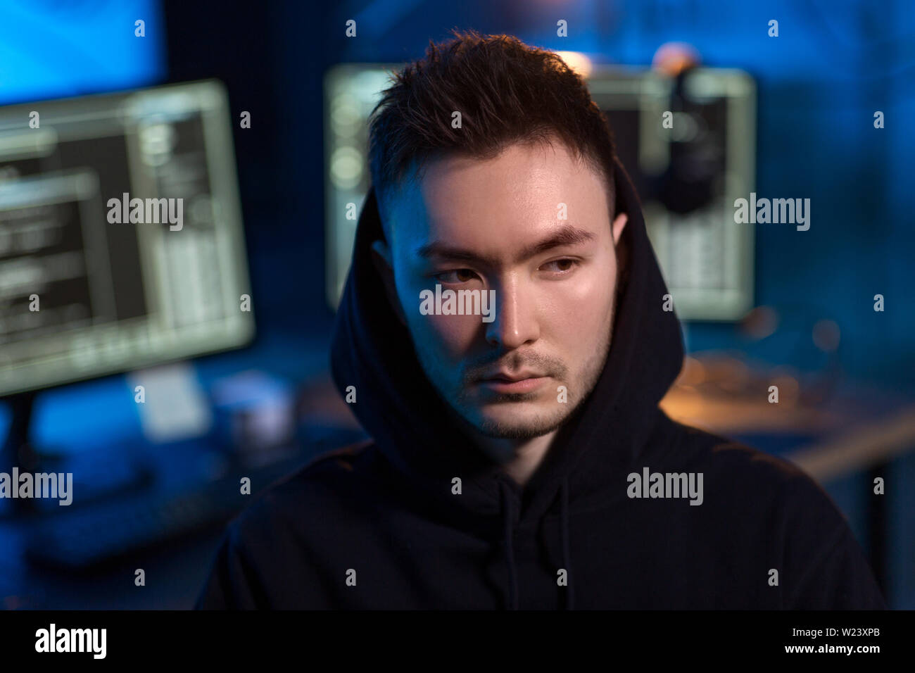 asian hacker in dark room with computers at night Stock Photo - Alamy