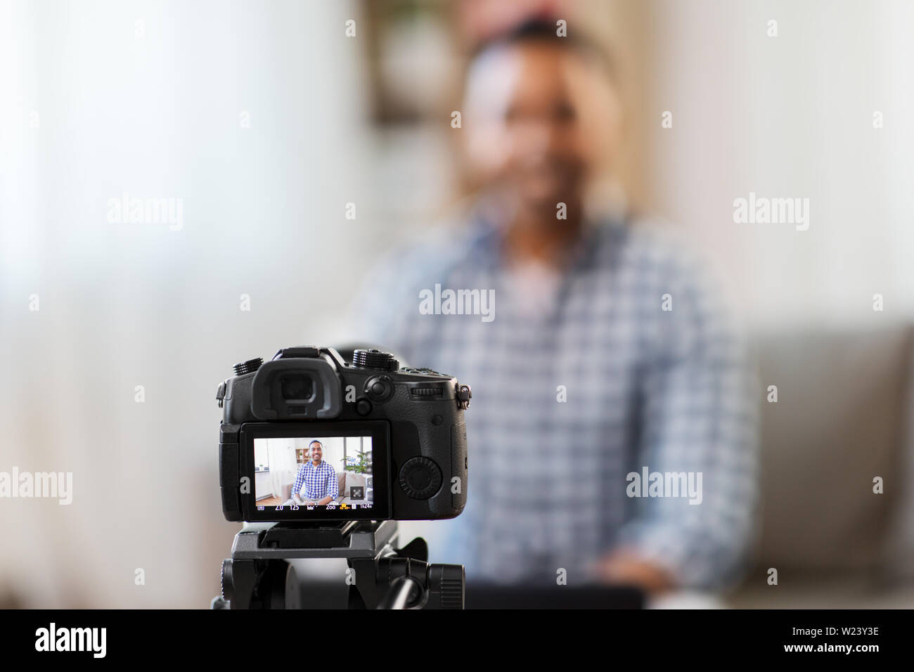 camera recording video blog of indian male blogger Stock Photo - Alamy