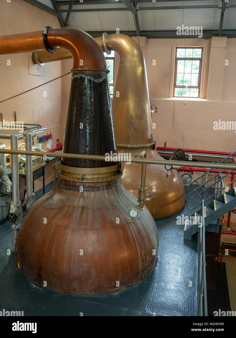 Whisky stills at a distillery in Scotland Stock Photo - Alamy