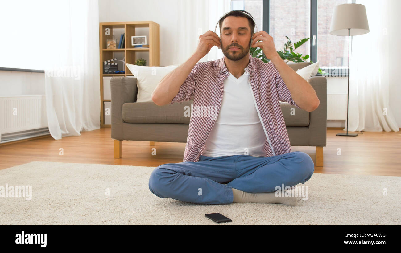 man in headphones chilling at home Stock Photo - Alamy