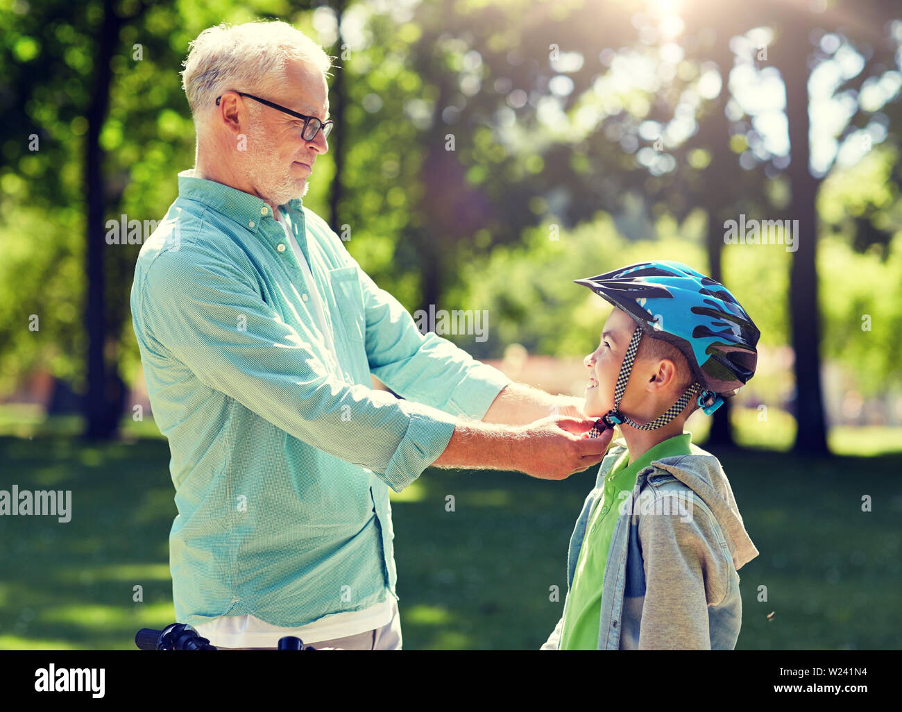Man helping boy hi-res stock photography and images - Alamy