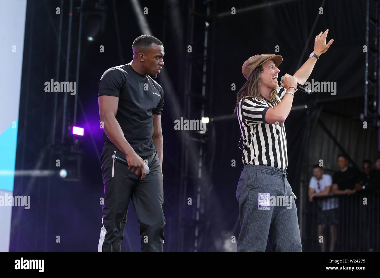 JP Cooper performs on stage with Bugzy Malone on Day 1 of Wireless ...