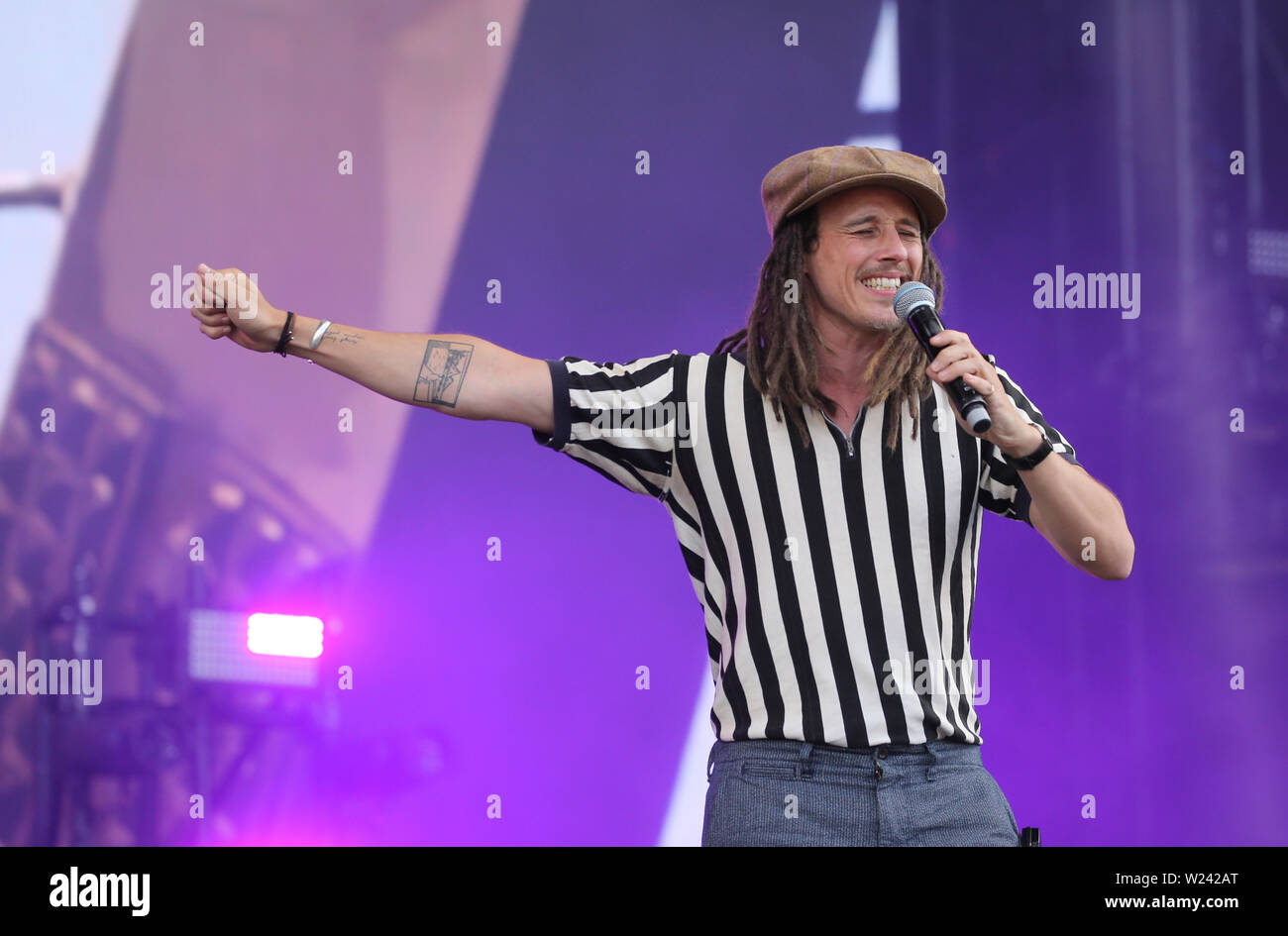 JP Cooper performs on stage with Bugzy Malone on Day 1 of Wireless ...