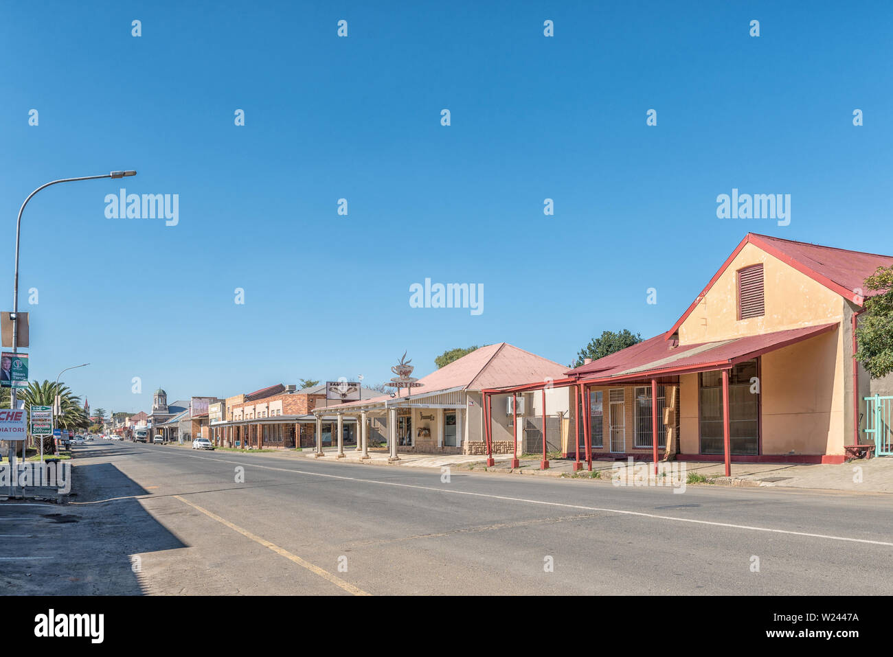 VREDE, SOUTH AFRICA - MAY 1, 2019: A street scene, with businesses and ...
