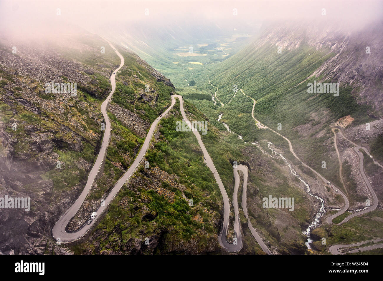 Amazing foggy landscape on the Trollstigen mountain road, part of the ...