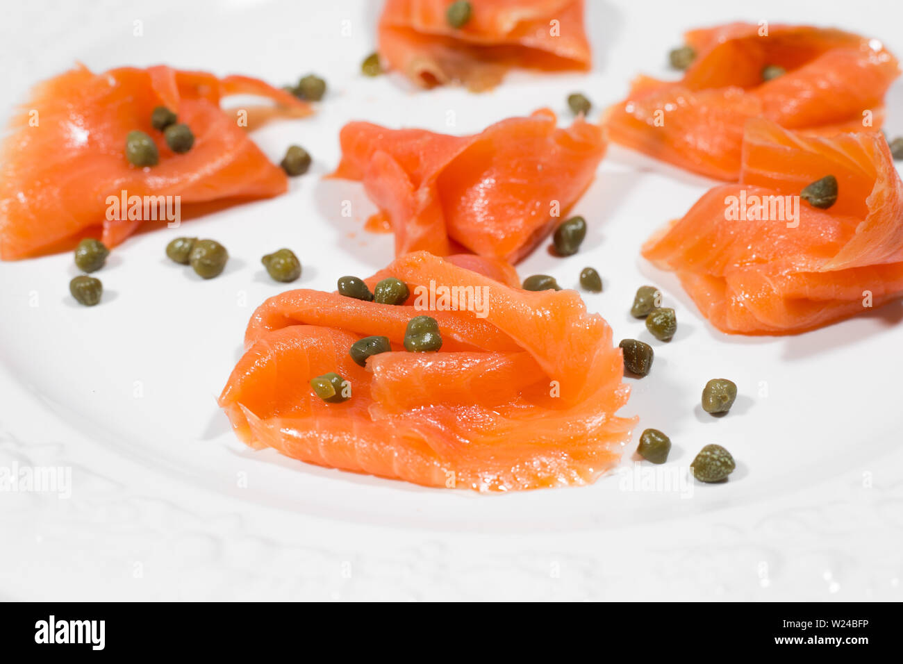 Sliced salmon fish fillet Stock Photo - Alamy