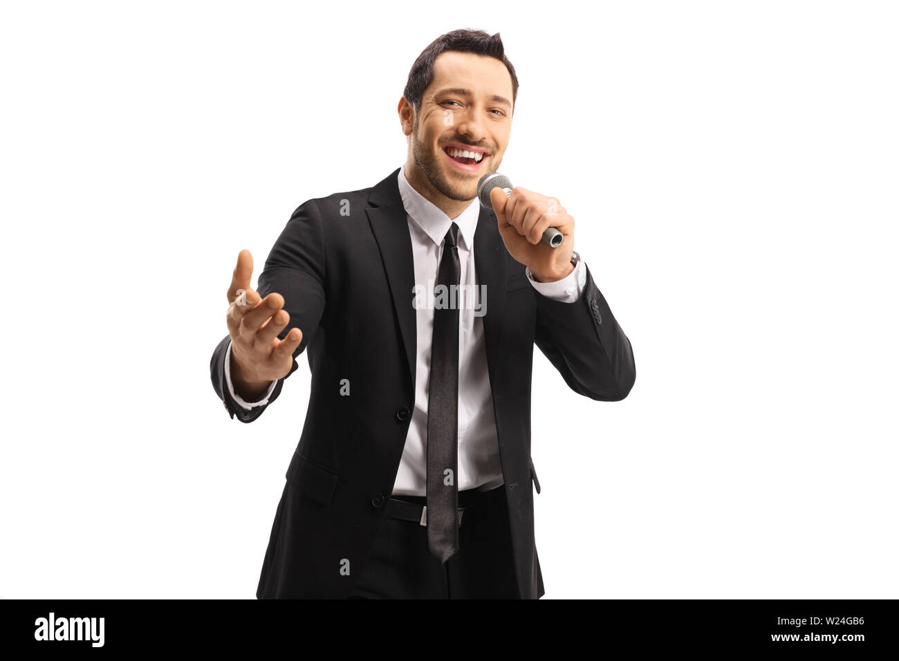 Man holding microphone hi-res stock photography and images - Alamy