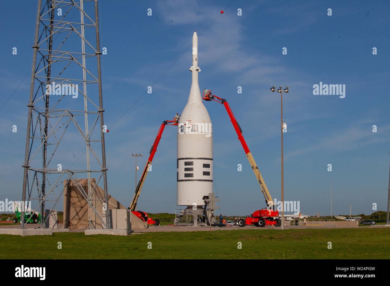 Technicians prepare the NASA Orion Launch Abort System for launch atop ...