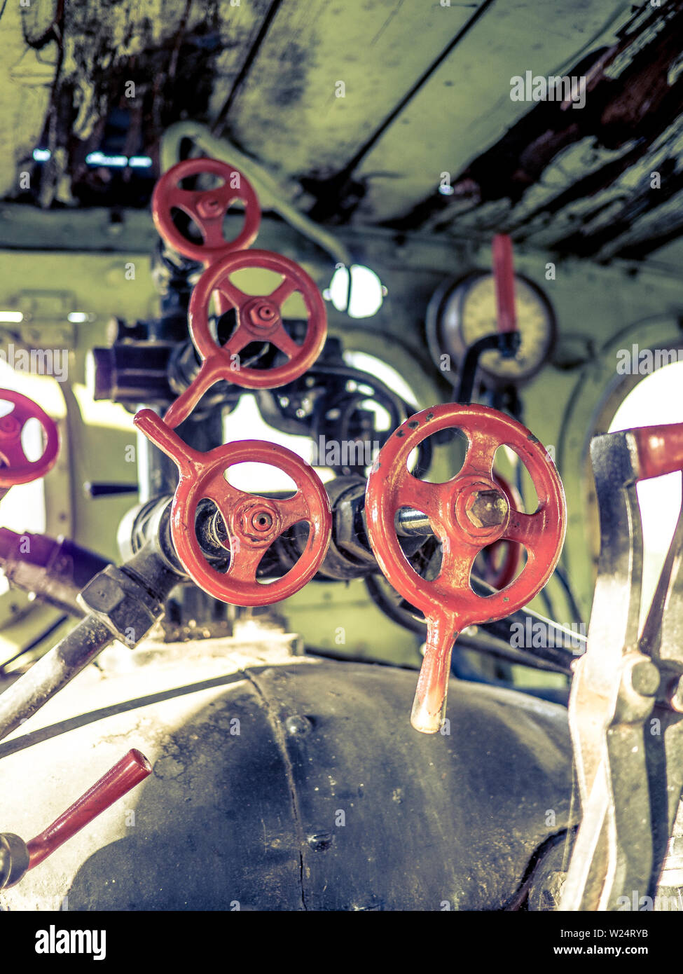 Brass steam engine valves hi-res stock photography and images - Alamy