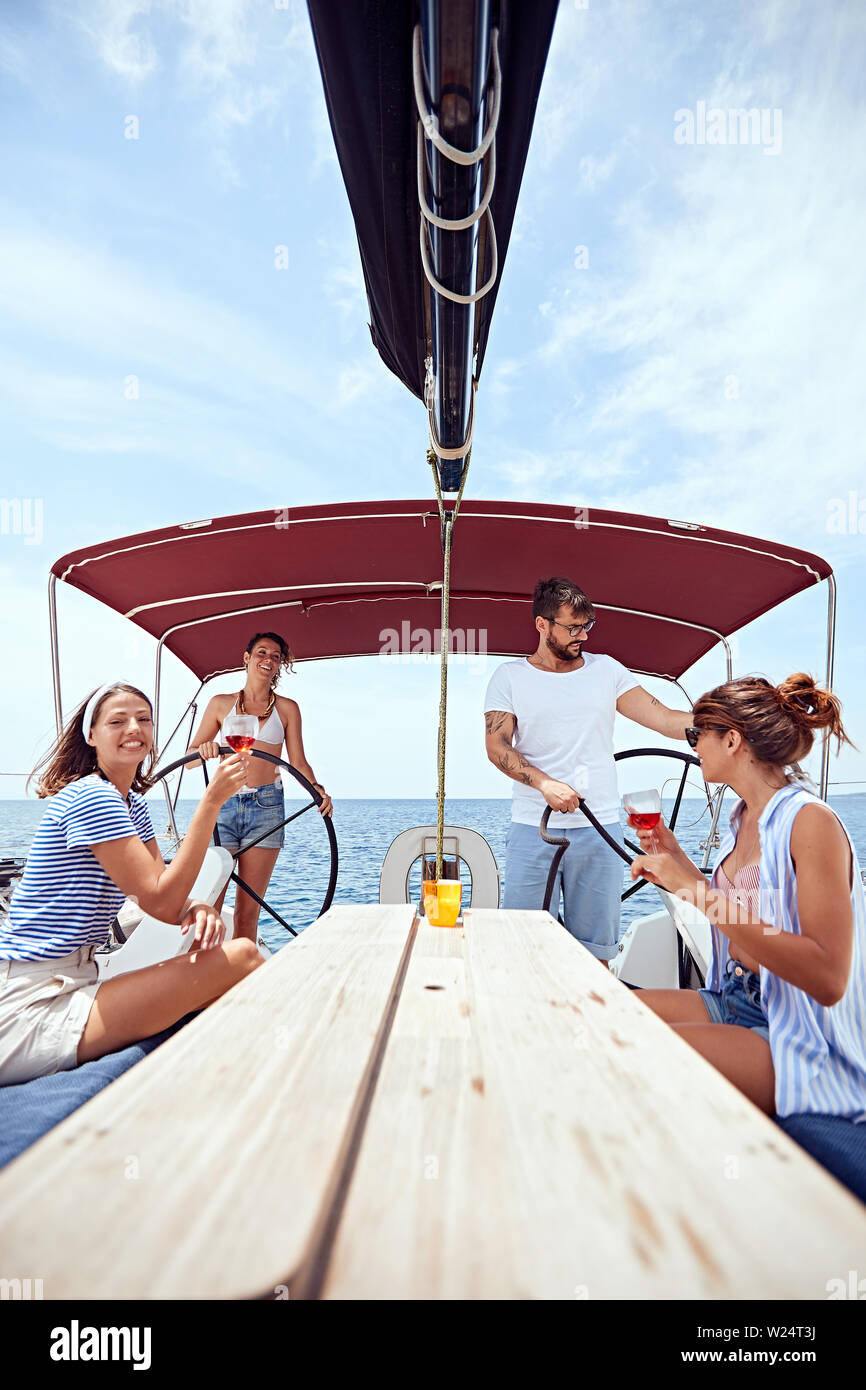 Young people resting on sailing hi-res stock photography and images - Alamy