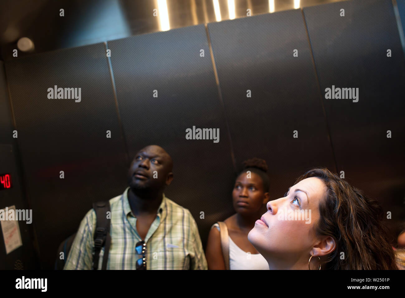 Riding elevator hi-res stock photography and images - Alamy