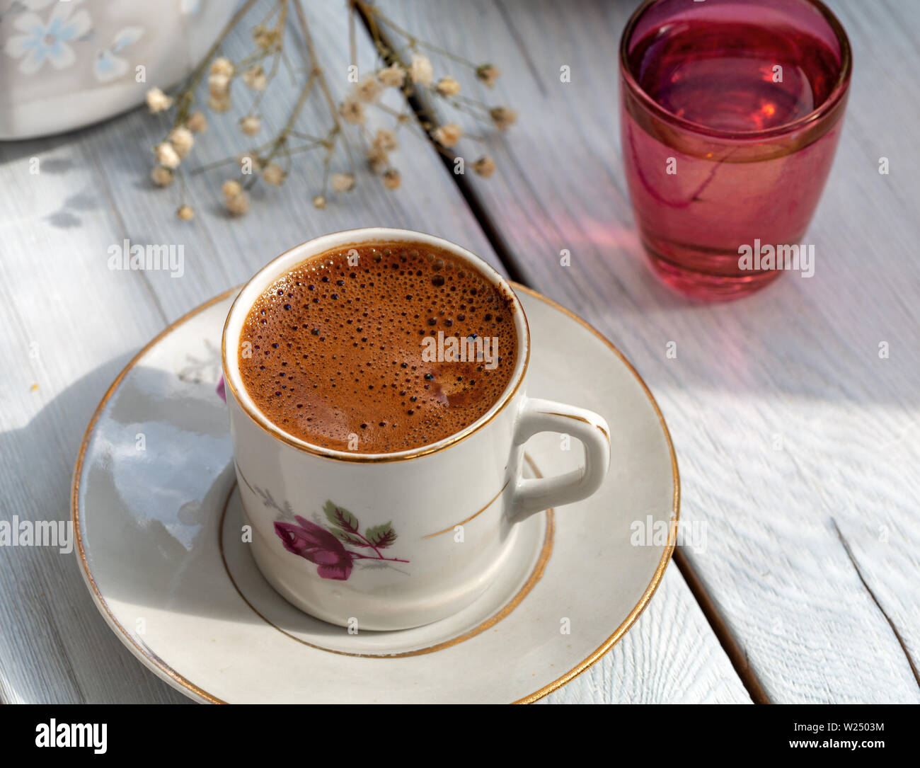 A cup of Turkish coffee and water Stock Photo - Alamy