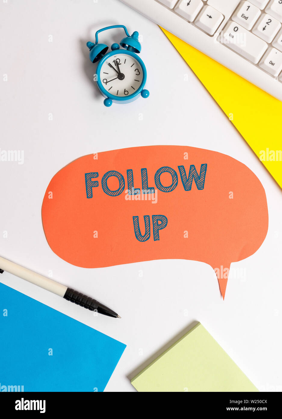 Writing note showing Follow Up. Business concept for a continuation of ...