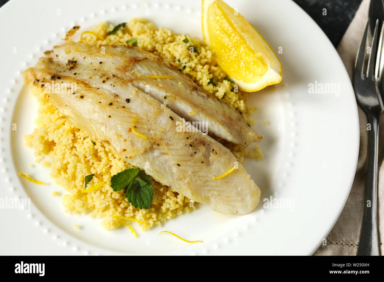 Fried Basa Fillet with Lemon Couscous Stock Photo - Alamy