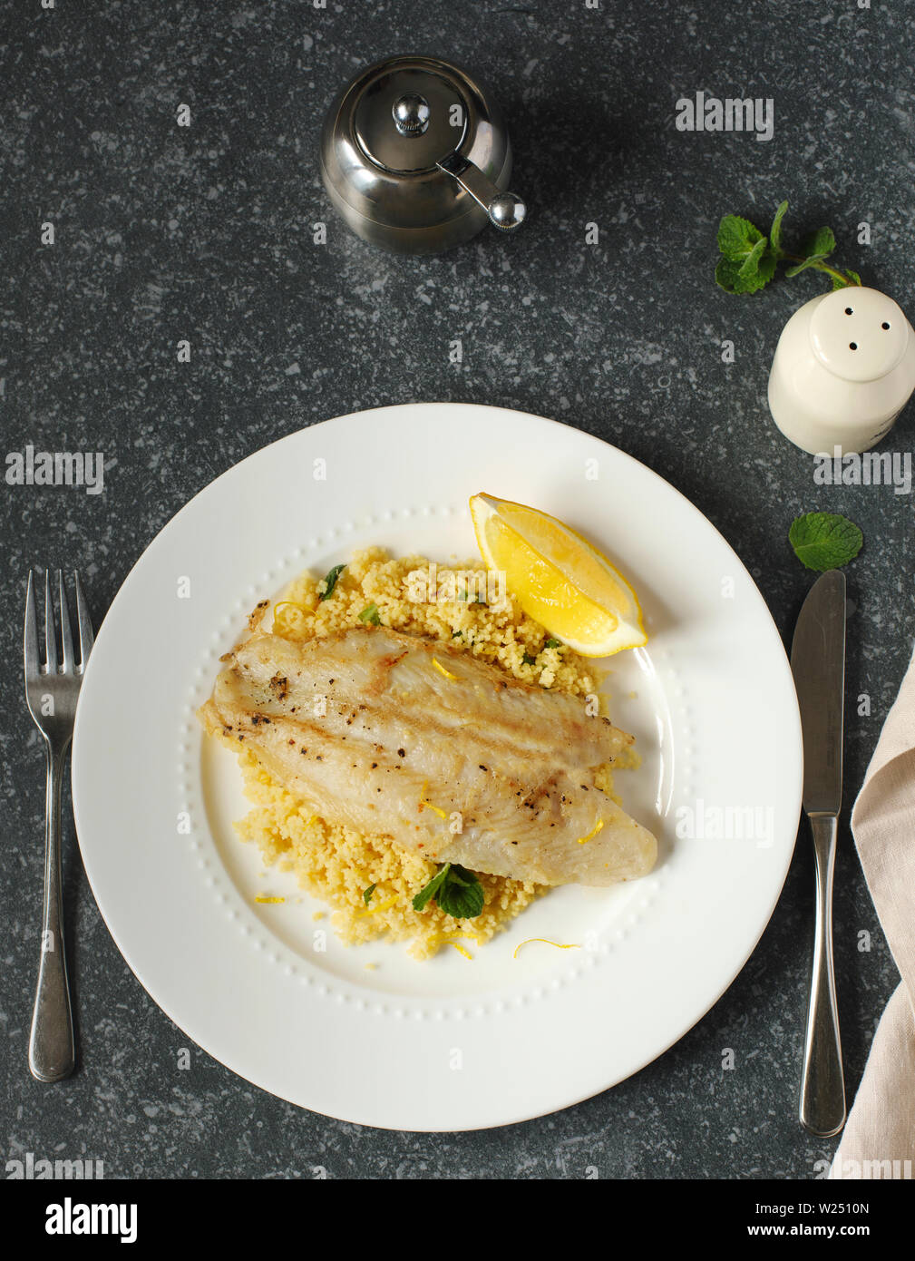 Fried Basa Fillet with Lemon Couscous, top view Stock Photo - Alamy