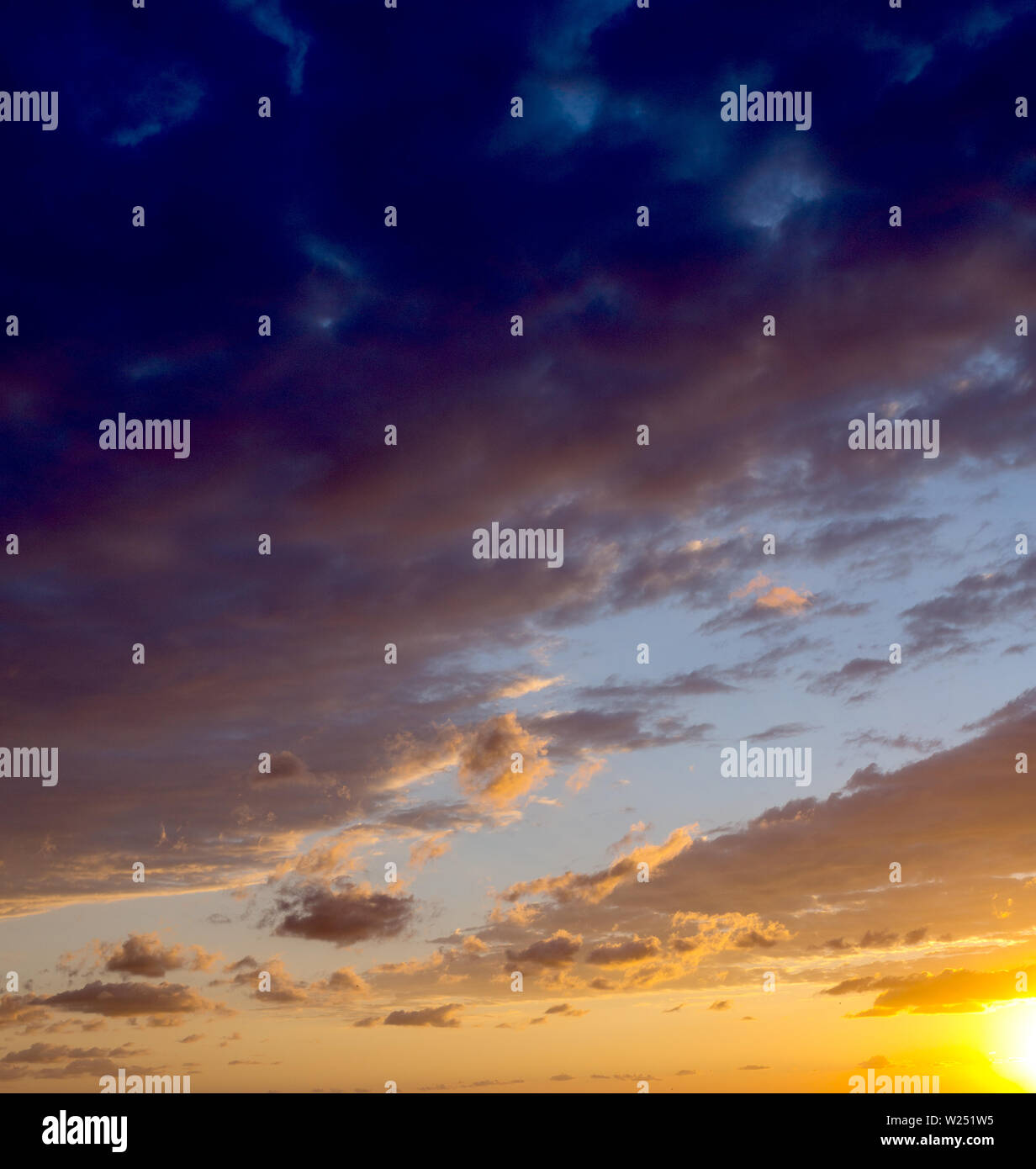 Dark blue stormy cloudy sky natural photo background Stock Photo - Alamy