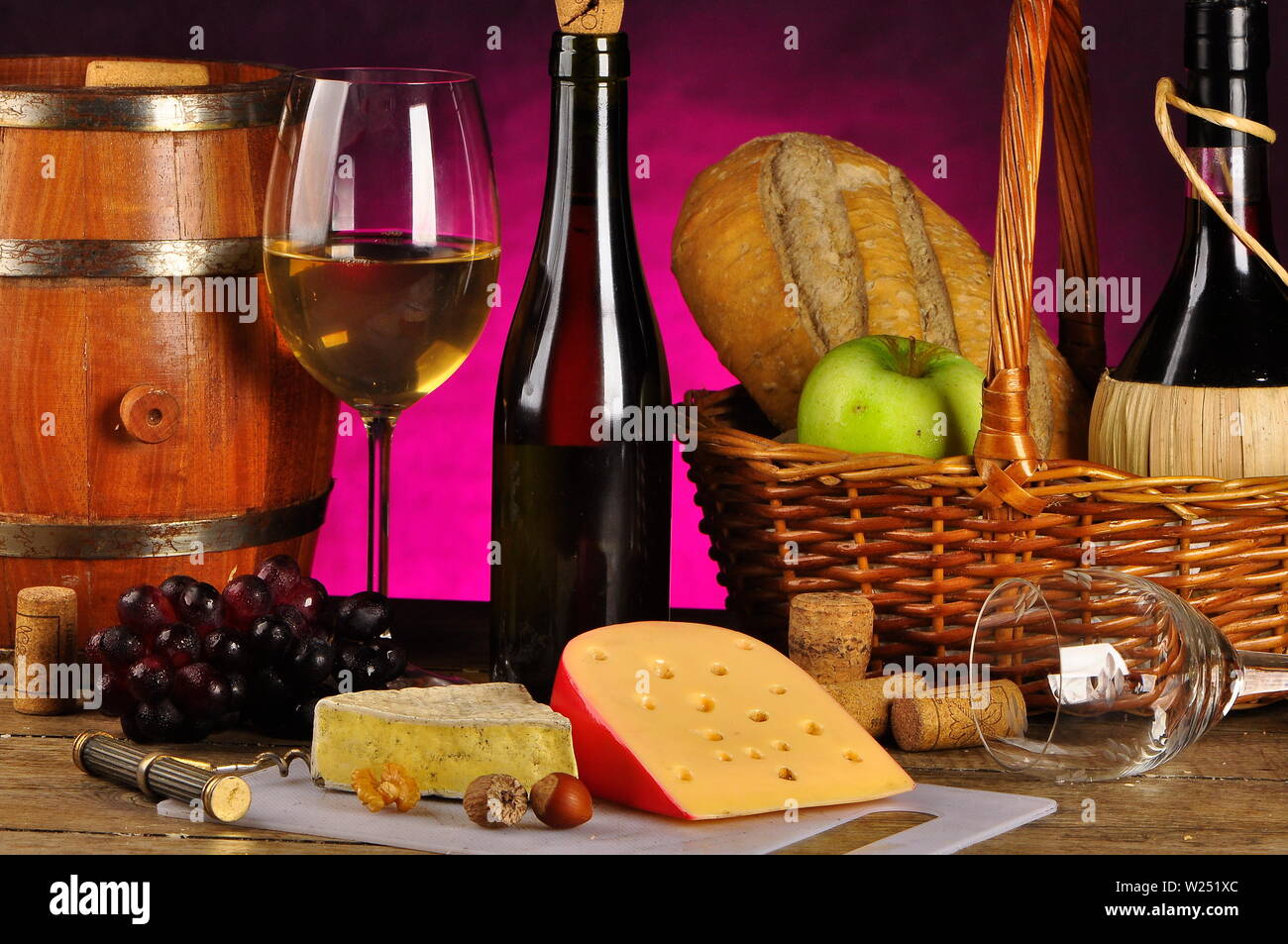 Table cheese and wine setup Stock Photo - Alamy