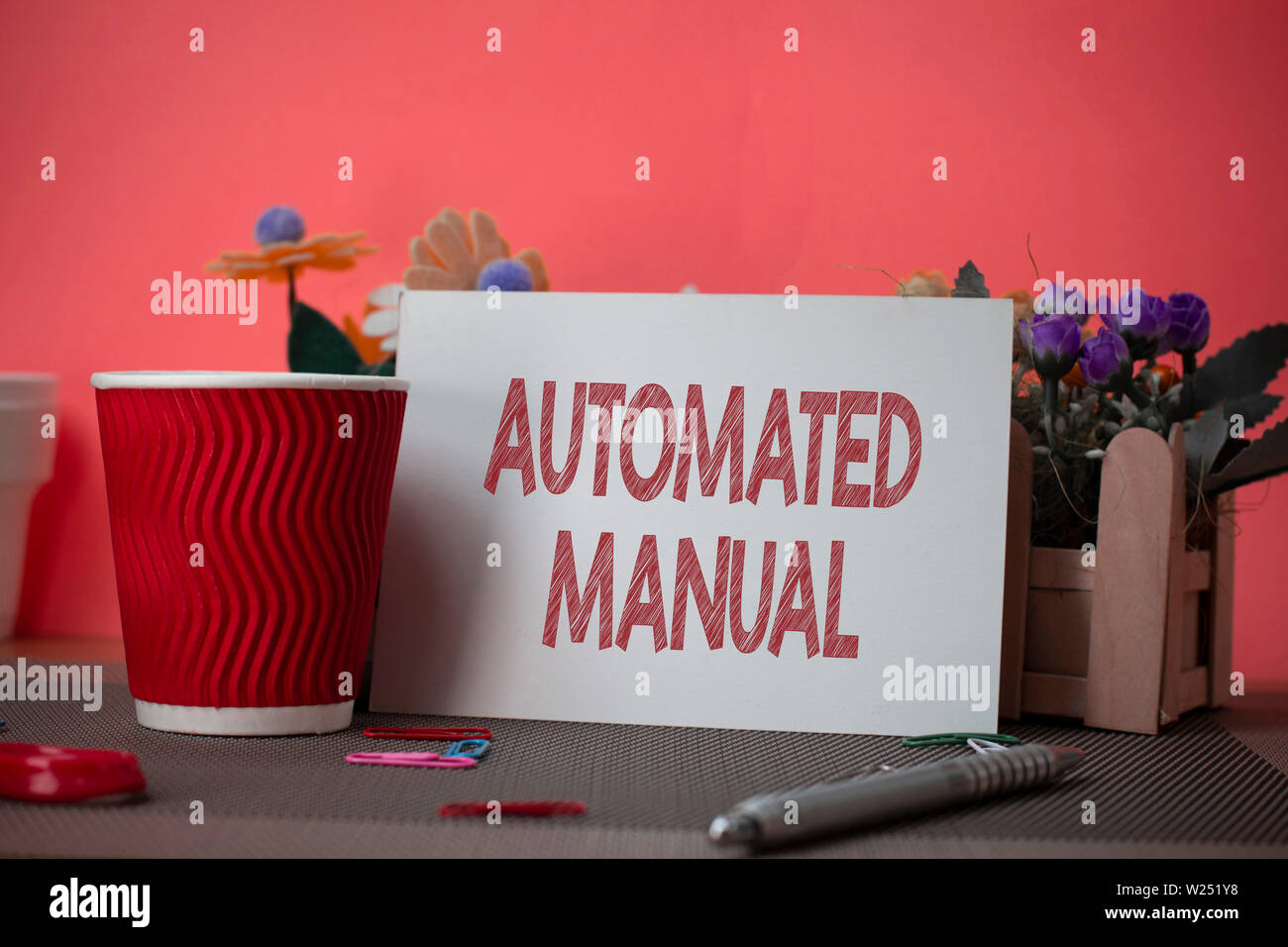Writing note showing Automated Manual. Business concept for as trigger ...