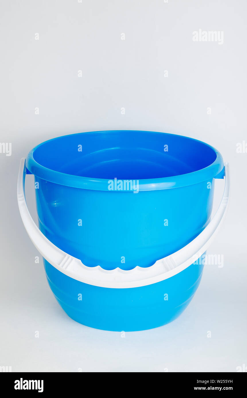 Bucket new blue empty isolated on white background Stock Photo - Alamy