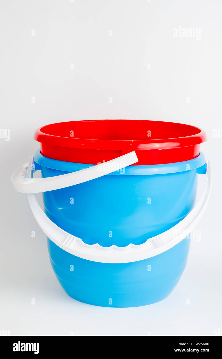 Two color new buckets on white background Stock Photo - Alamy
