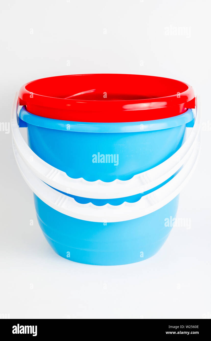 Two color new buckets on white background Stock Photo - Alamy