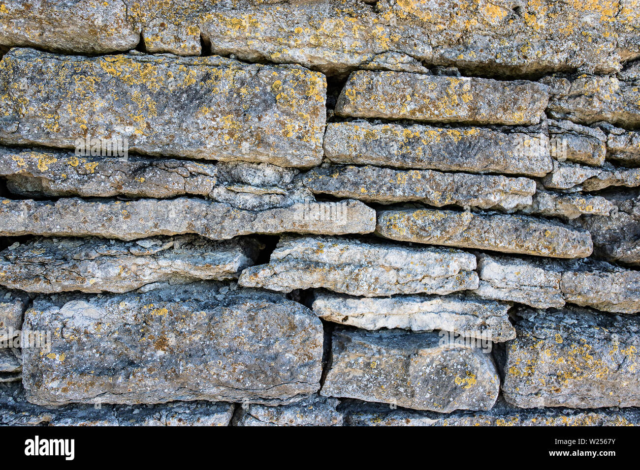 Ancient medieval stone wall covered with moss is suitable for background Stock Photo - Alamy