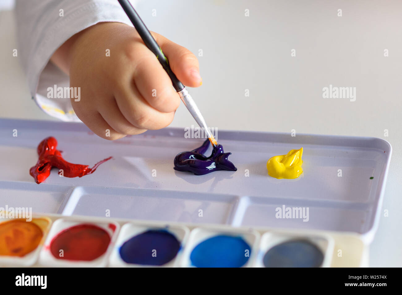 Painted hands and brushes hi-res stock photography and images - Alamy
