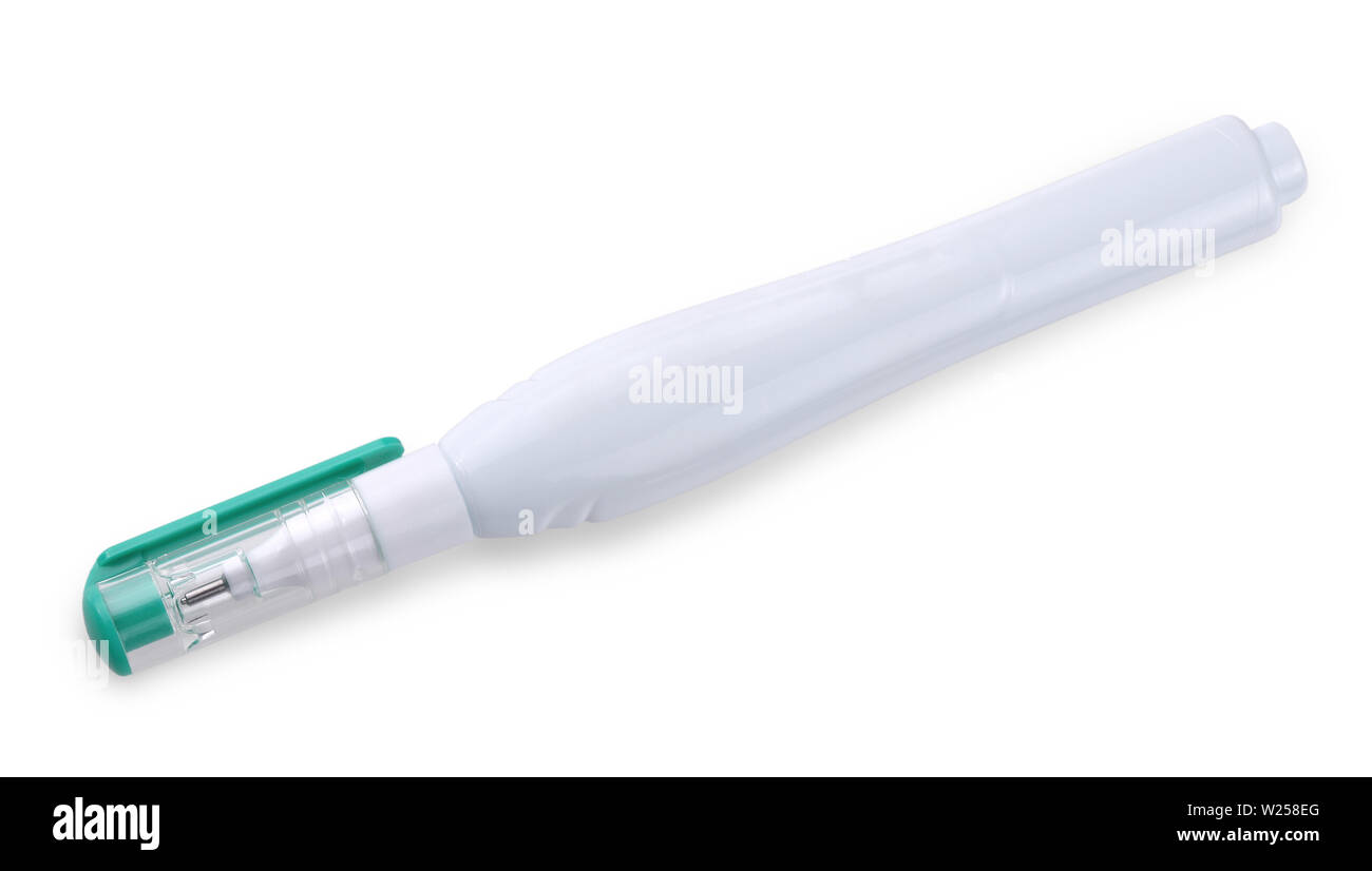 Green pen corrector on a white background Stock Photo - Alamy